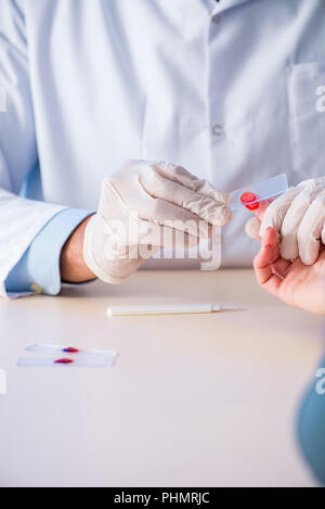 Nurse taking blood sampling from female patient on the analysis Stock ...