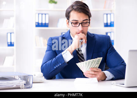 Businessman receiving his salary and bonus Stock Photo - Alamy