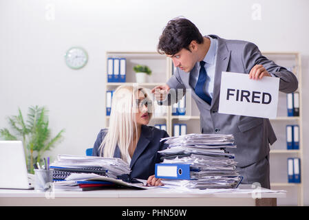 Angry boss firing his assistant secretary Stock Photo - Alamy