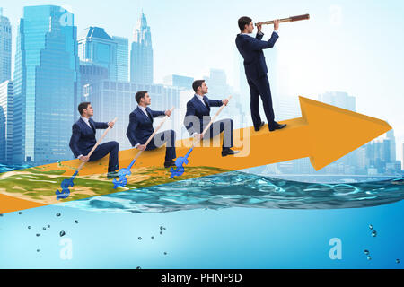 Teamwork concept with businessmen on boat Stock Photo - Alamy
