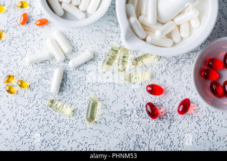 Set of different tablets, pills and capsules in blister packages on ...