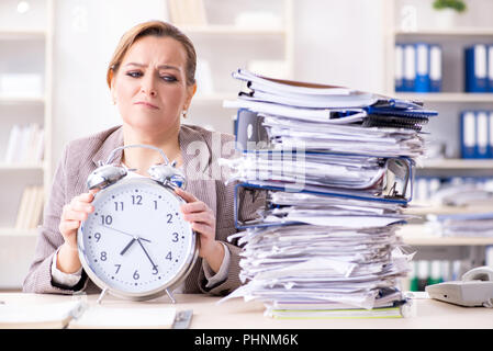Businesswoman workaholic trying to finish urgent paperwork Stock Photo ...