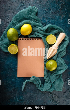Fresh limes with citrus juicer stick Stock Photo - Alamy