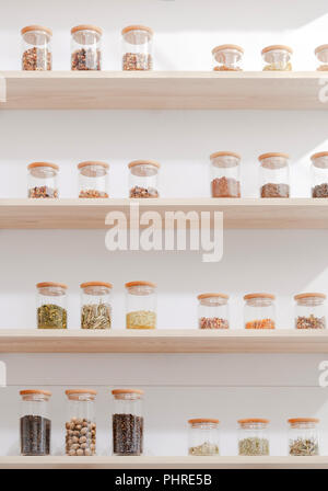 Wooden shelves on white wooden background For display Stock Photo - Alamy