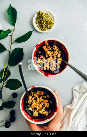 Green leaves in hand on linen canvas Stock Photo - Alamy