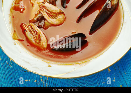 New England Bouillabaisse, clams, mussels, left over fish and herbs for ...