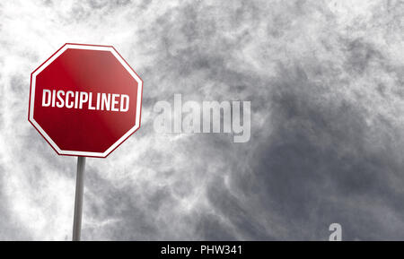 disciplined - red sign with clouds in background Stock Photo - Alamy