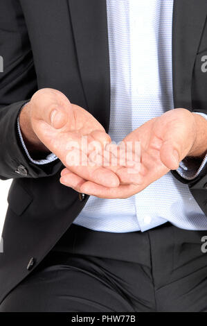 Business man holding nothing with hands up Stock Photo - Alamy