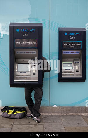 ATM repair man Stock Photo - Alamy