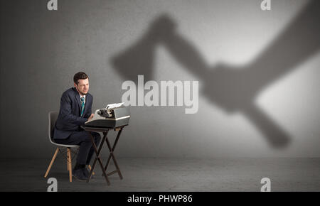 Shadow threatening hard worker man who is afraid Stock Photo - Alamy