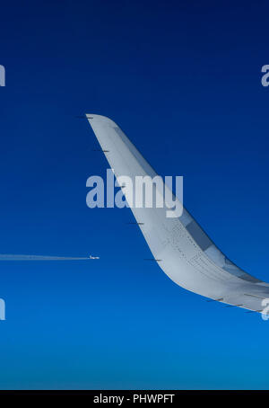 Curved wingtip, known as a “winglet”, of a modern passenger jet. The ...