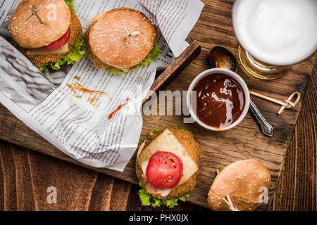 Mini beef burgers served in pub or bar Stock Photo - Alamy