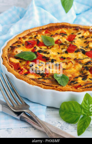 A delicious pastry in a mold with tasty icing on a wooden railing Stock ...