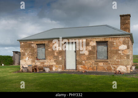 Australian colonial sandstone brick cottage house with verandah, tin ...