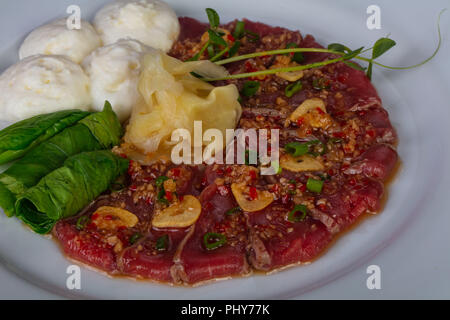 Raw Japanese young Beef carpaccio Stock Photo - Alamy