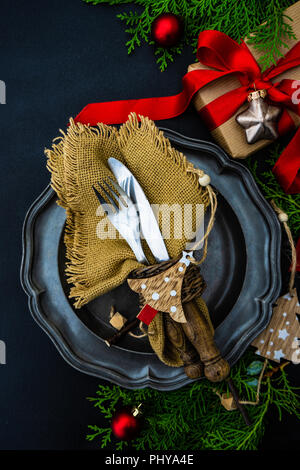 Christmas table setting on rustic wooden background with copy space ...