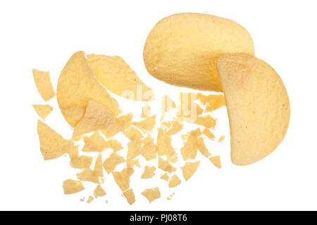 Potato chips crumbs and leftovers isolated over the white background ...