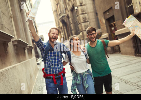 Happy group of tourists traveling and sightseeing together Stock Photo ...