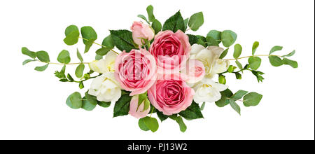 Horizontal arrangement with pink roses and freesia flowers isolated on ...
