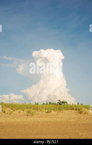 Incredible colorful big cloud formation. Blue sunny sky Stock Photo - Alamy