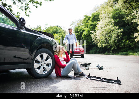 Man running towards a car Stock Photo - Alamy