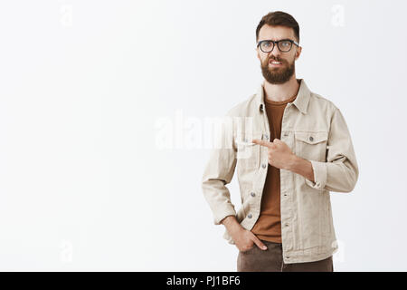 disgust dislike bearded hipster guy sceptic Stock Photo - Alamy