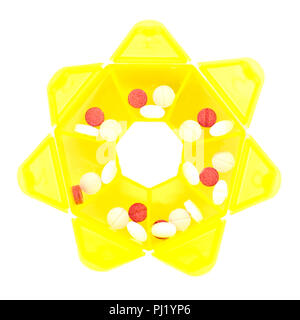 Top view of pink and yellow tablets pill in blister packs. NSAIDs can ...