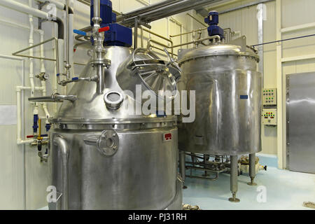 Interior of cheese factory with fermentation tank. Technology equipment ...
