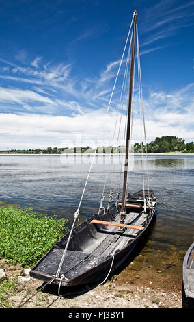 A traditional Loire River flat bottomed wooden Gabares saling boat at ...