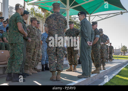 Brig. Gen. Roger Turner, center, commanding general of Task Force ...