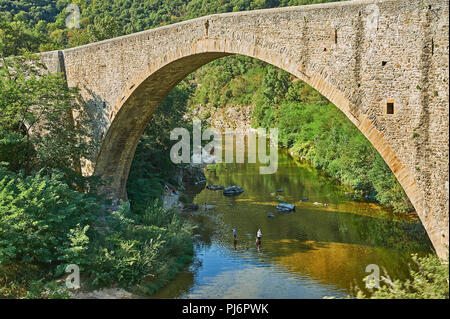 Stone bridge over the river Ardeche near Pradons in the department ...
