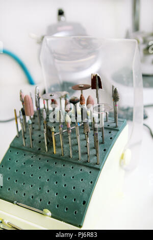 Different dental tools and burs. Dentures and dentistry. Dental ...