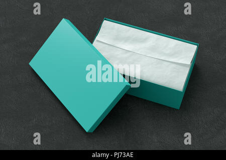 Turquoise shoe box container on wooden background with wrapping paper ...
