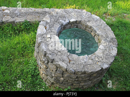 Old Round Stone Ground Water Well in Montenegro Stock Photo - Alamy
