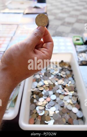 Coins Market in the Plaza del Cabildo in Seville Stock Photo - Alamy