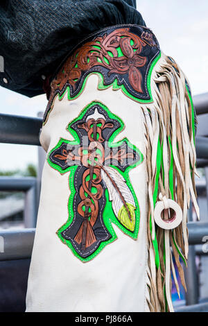 Cowboy in western chaps. Texas rodeo USA Stock Photo - Alamy