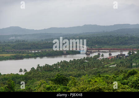 Konkan Railway train. Bridge over Zuari River Goa India Stock Photo - Alamy