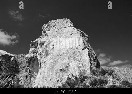 Large rocks line the walking trail of the Boquer valley in the ...