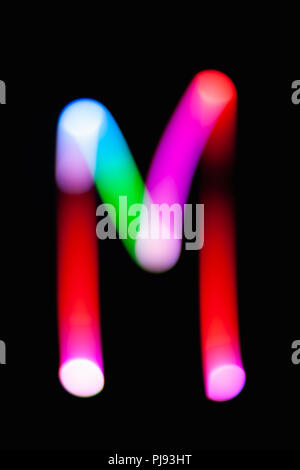 Letter M. Light painting alphabet. Long exposure photography. Drawing ...