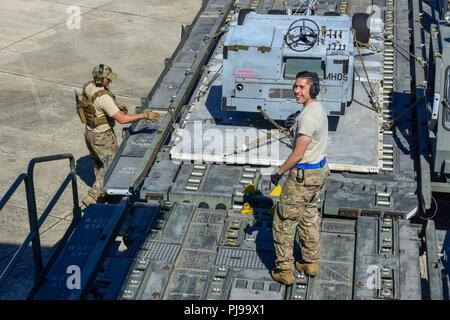 Airmen from the 407th Expeditionary Logistics Readiness Squadron and ...