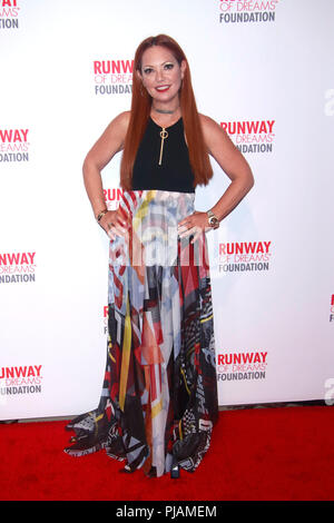 NEW YORK, NY - SEPTEMBER 5: Mindy Scheier and RJ Mitte at the Runway of ...