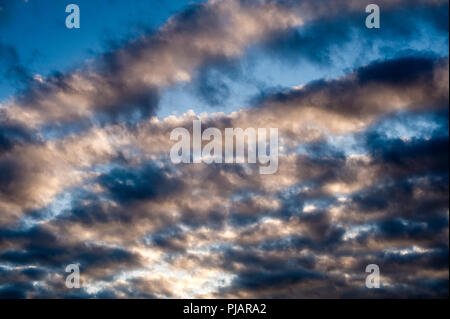 Altocumulus perlucidus toward sunset Stock Photo - Alamy