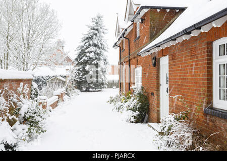brick manor home in the wintertime Stock Photo - Alamy