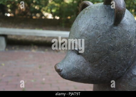 Bronze statue of Winnie the Pooh Bear with Lieutenant Harry Colebourn ...