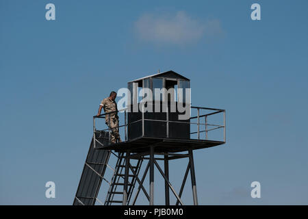 A Lebanese soldier stands outside a watchtower at the Lebanese side of ...