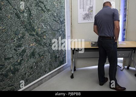 A static display at the entry to Hacksaw Ridge shows a scaled model of ...