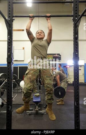 Spc. Diane Hoang from the U.S. Army Training Center zeros her weapon ...