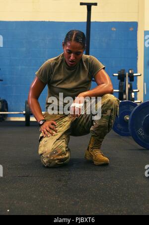 Spc. Diane Hoang from the U.S. Army Training Center zeros her weapon ...
