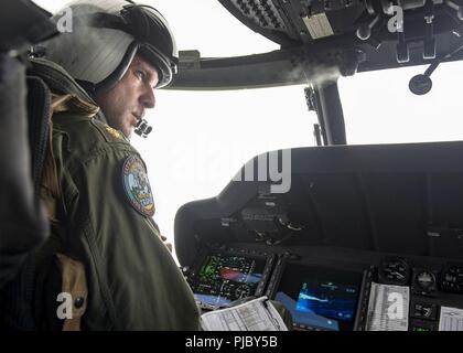 U.S. Navy Lt. Cmdr. Brian Vaught and Lt. Cmdr. Thomas Zimmerman, pilots ...