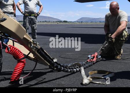 A tactical air navigation (TACAN) system van is positioned facing ...